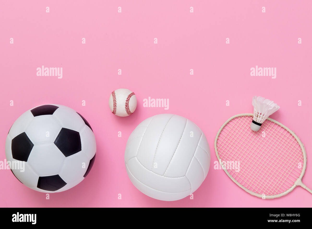 Assorted sports equipment on a pink background with copy space Stock ...