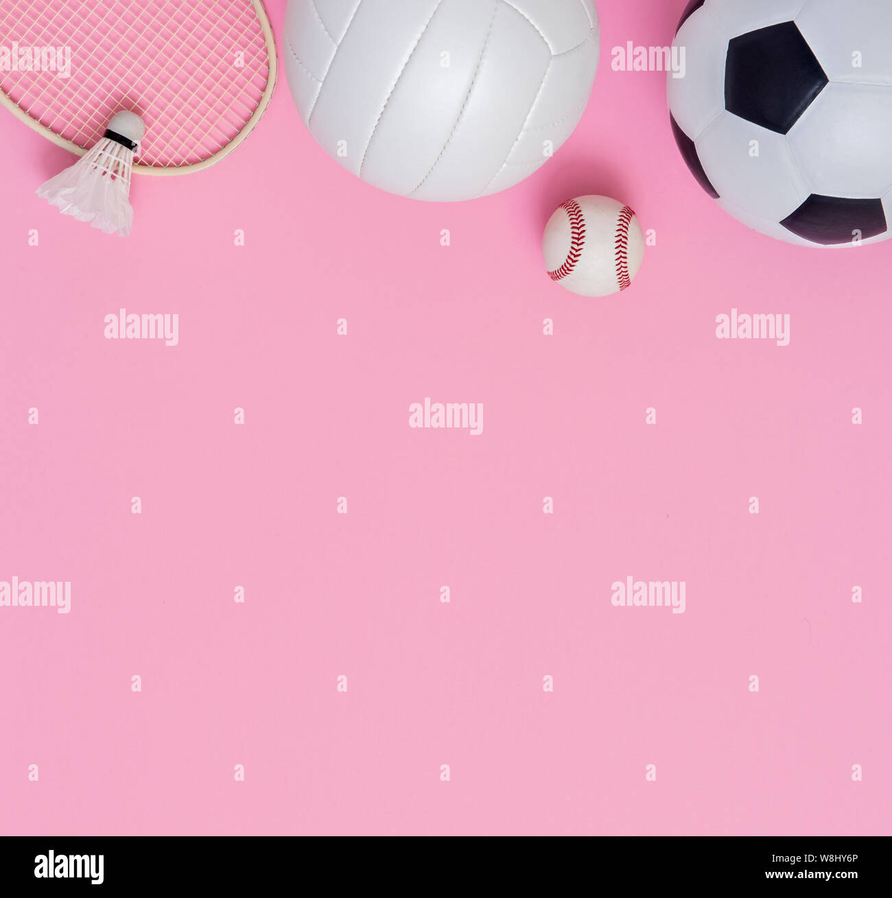 Assorted sports equipment including a basketball, soccer ball ...