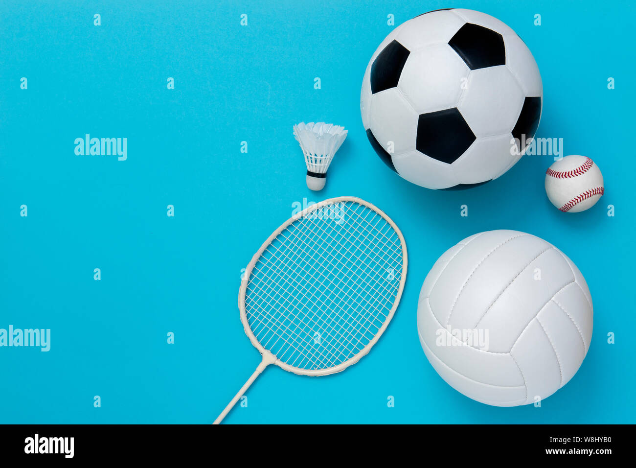 Assorted sports equipment including a basketball, soccer ball ...