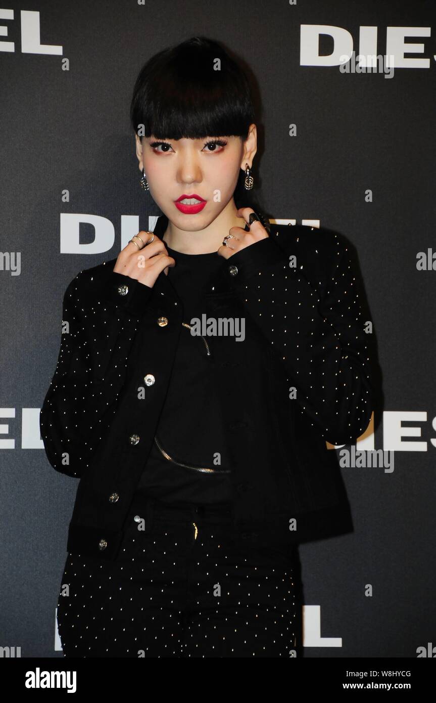 Chinese singer MoMo Wu poses at the Diesel fashion show during the ...