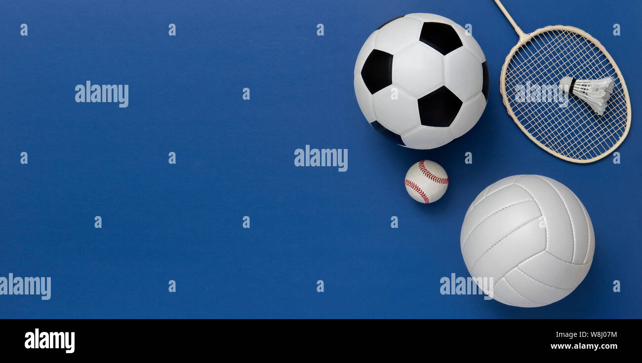 Assorted sports equipment including a basketball, soccer ball ...