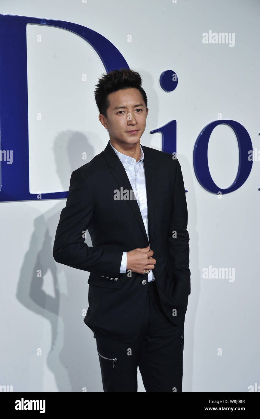 Chinese singer and actor Han Geng poses as he arrives for the Dior ...