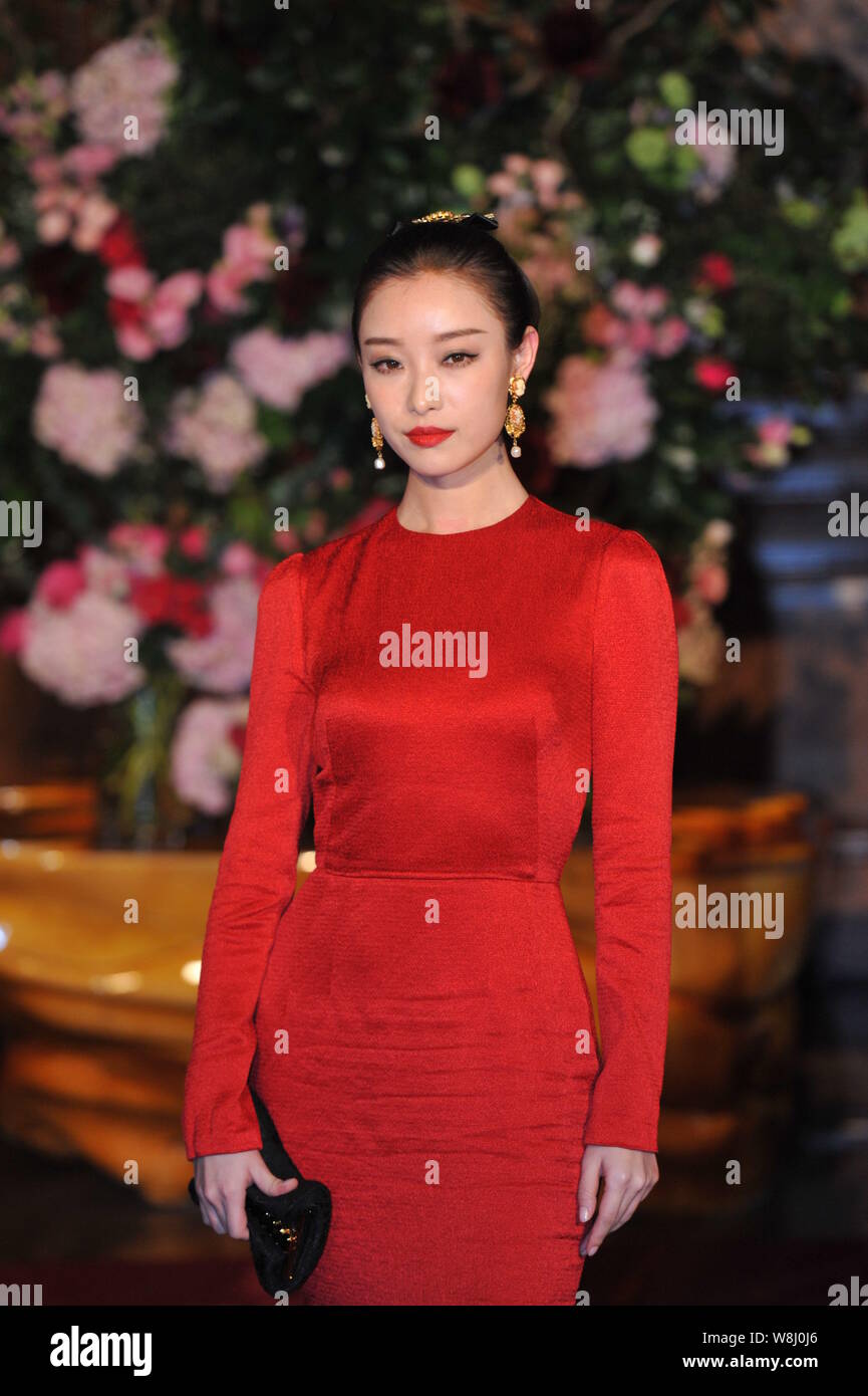 Chinese actress Ni Ni poses at a Dolce & Gabbana VIP dinner party in ...