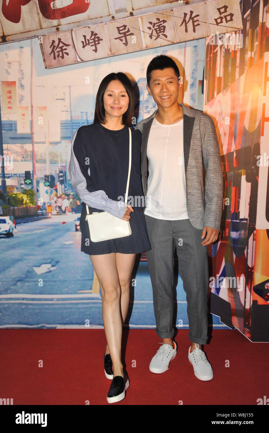 Chinese actor Xia Yu, right, and his actress wife Yuan Quan pose on the ...