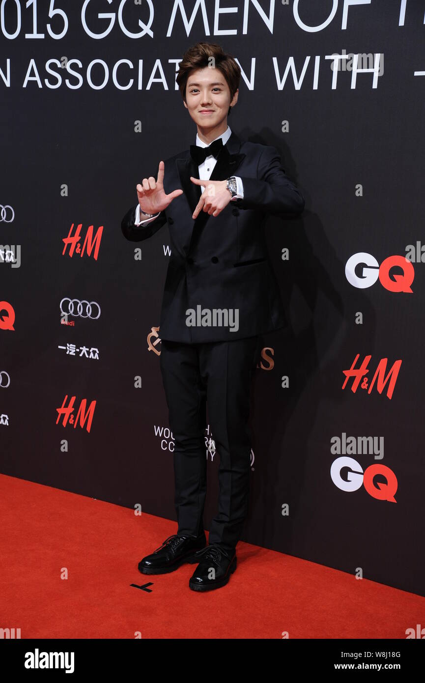 Chinese singer and actor Lu Han poses on the red carpet as he arrives ...