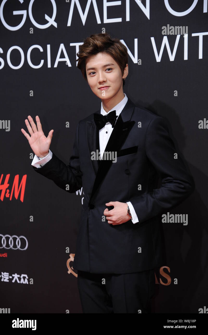 Chinese singer and actor Lu Han poses on the red carpet as he arrives ...