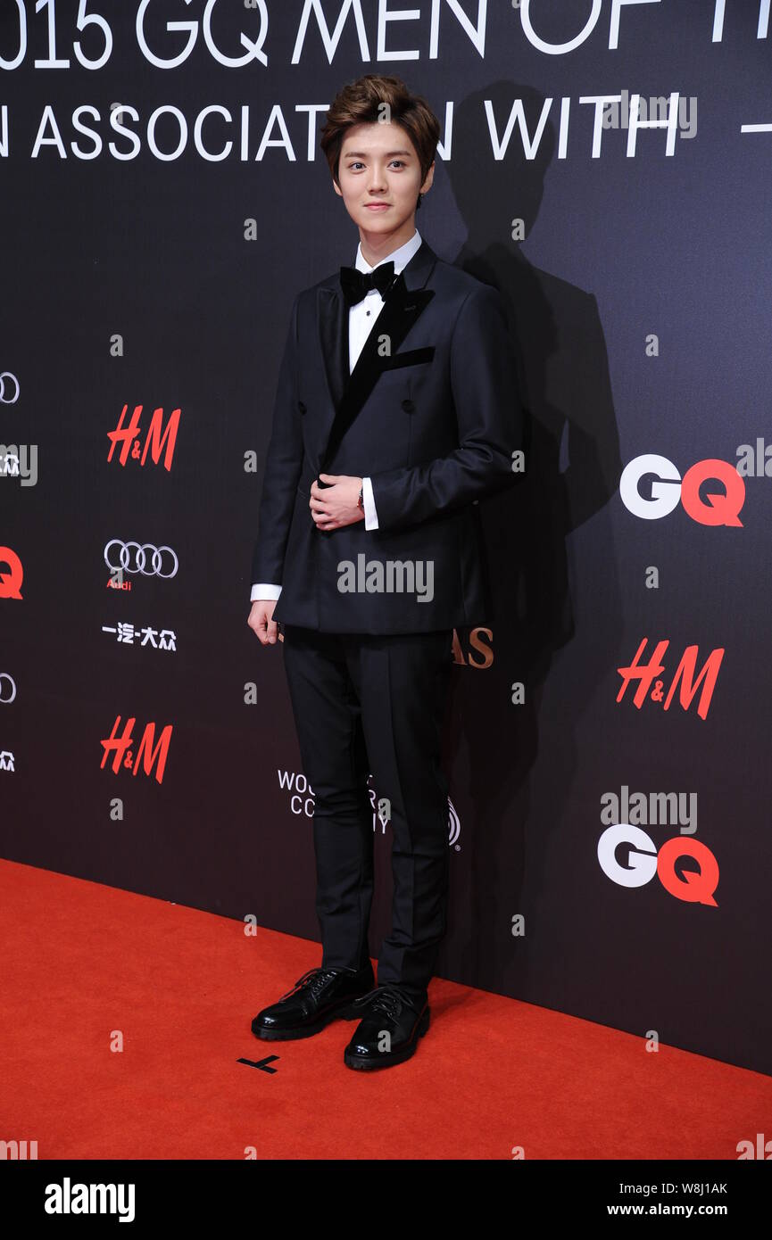 Chinese singer and actor Lu Han poses on the red carpet as he arrives ...