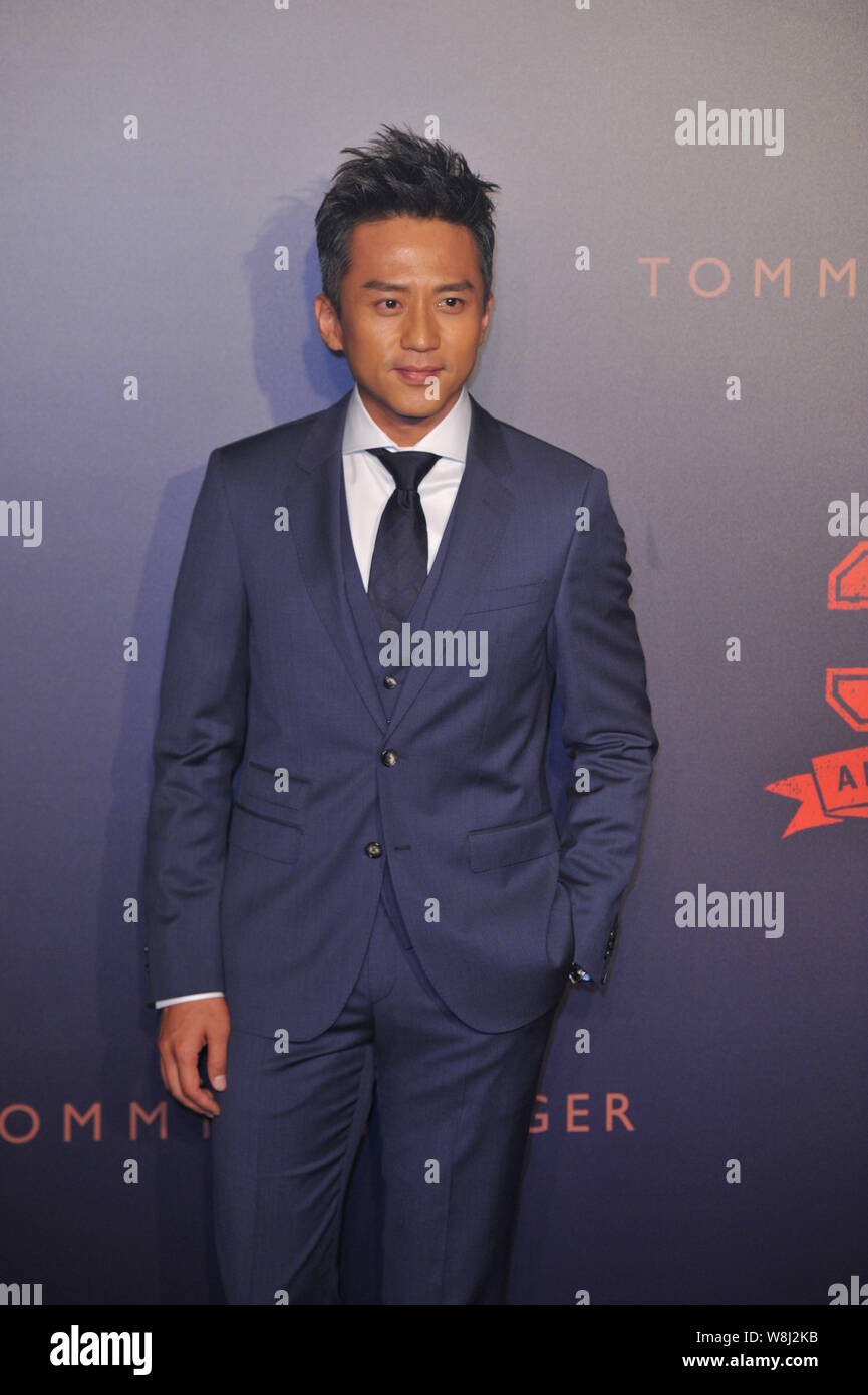 Chinese actor Deng Chao poses on the red carpet for the Tommy Hilfiger ...