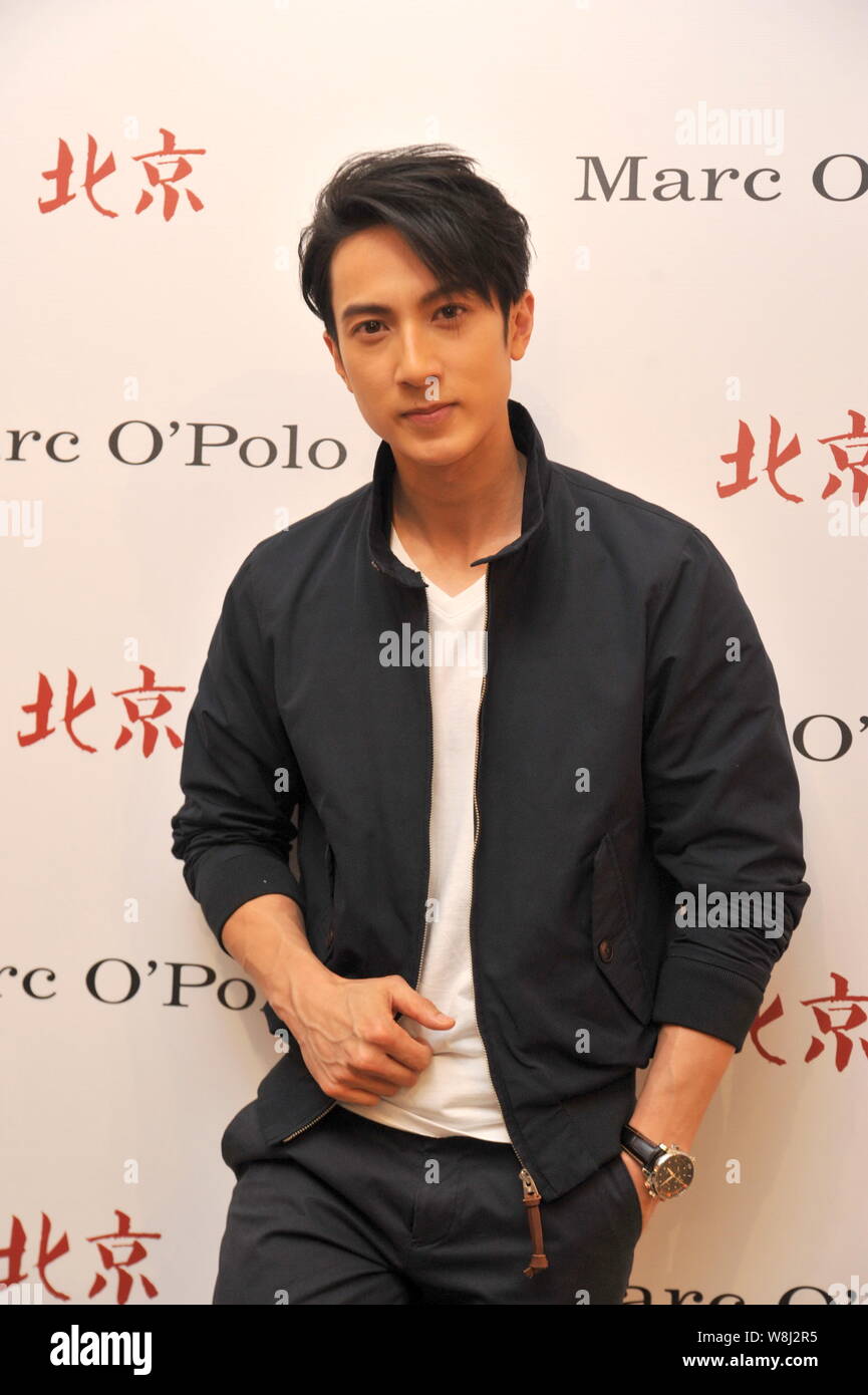 Bruneian singer and actor Wu Chun poses during the opening ceremony for ...