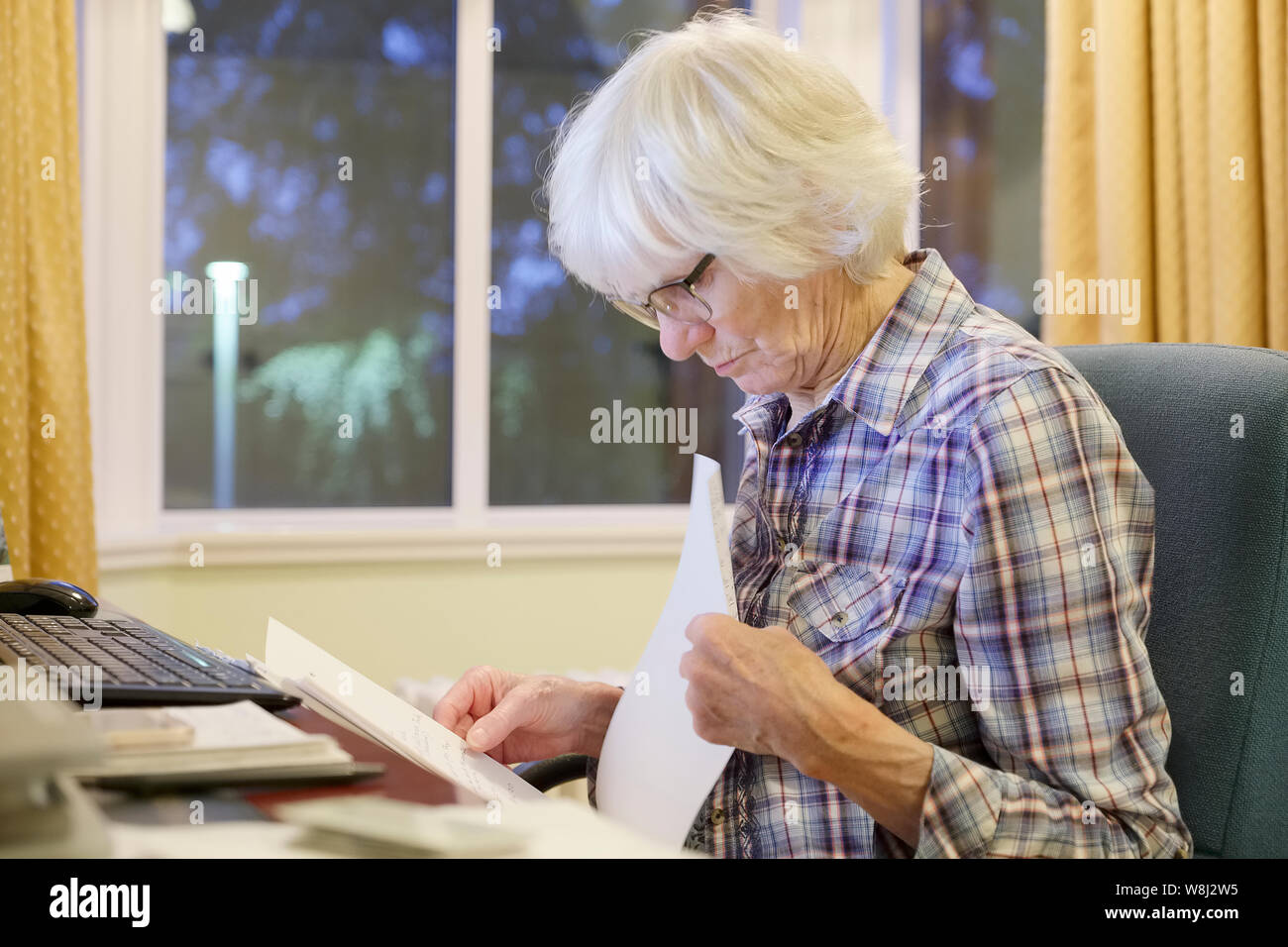 Senior old elderly person learning computer and online pension and ...