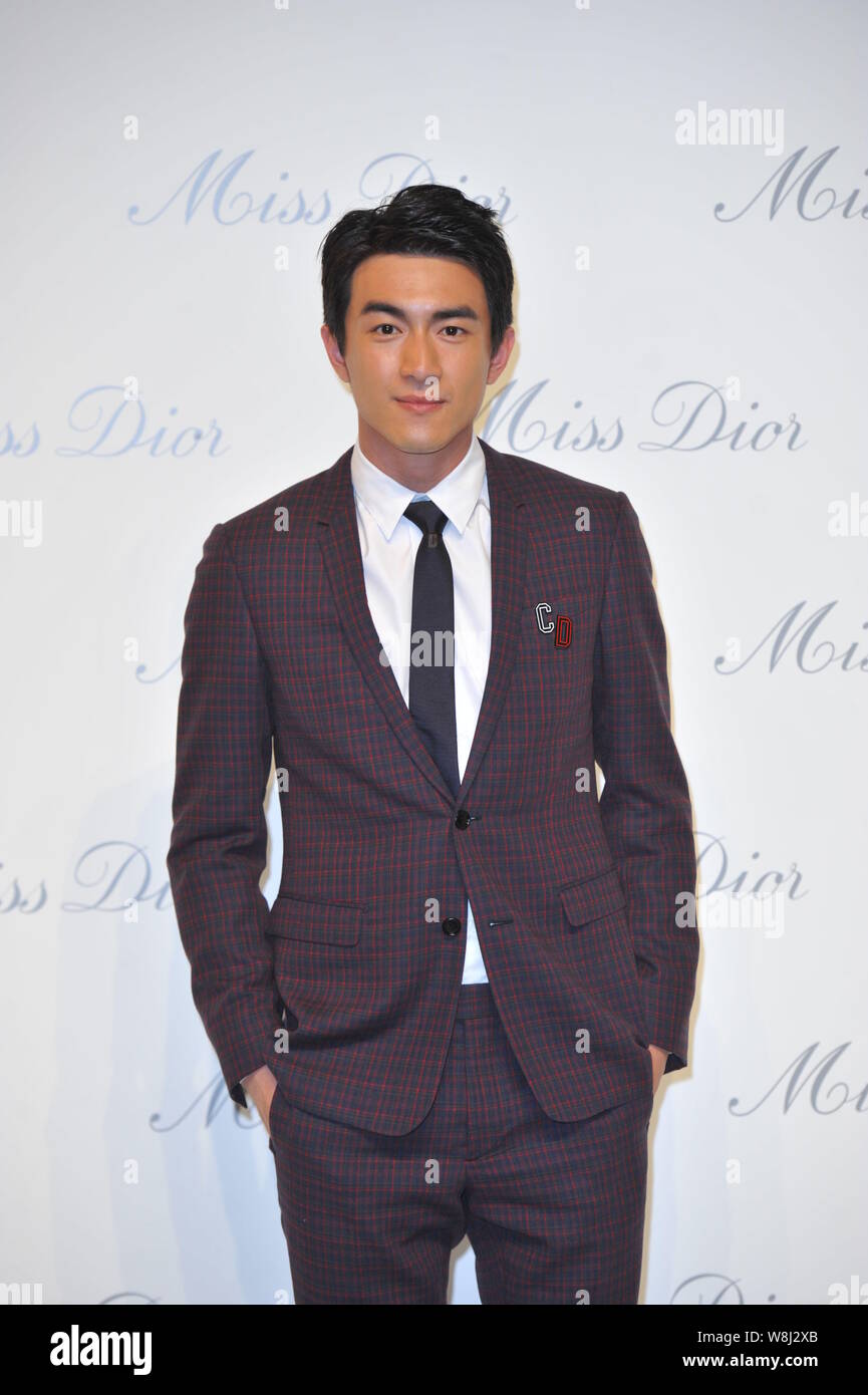 Chinese actor Lin Gengxin poses as he arrives for an opening event for ...