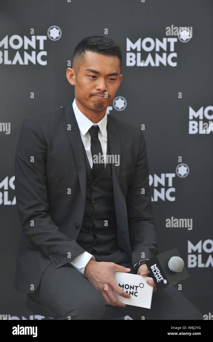 Chinese badminton player Lin Dan attends a press conference for ...