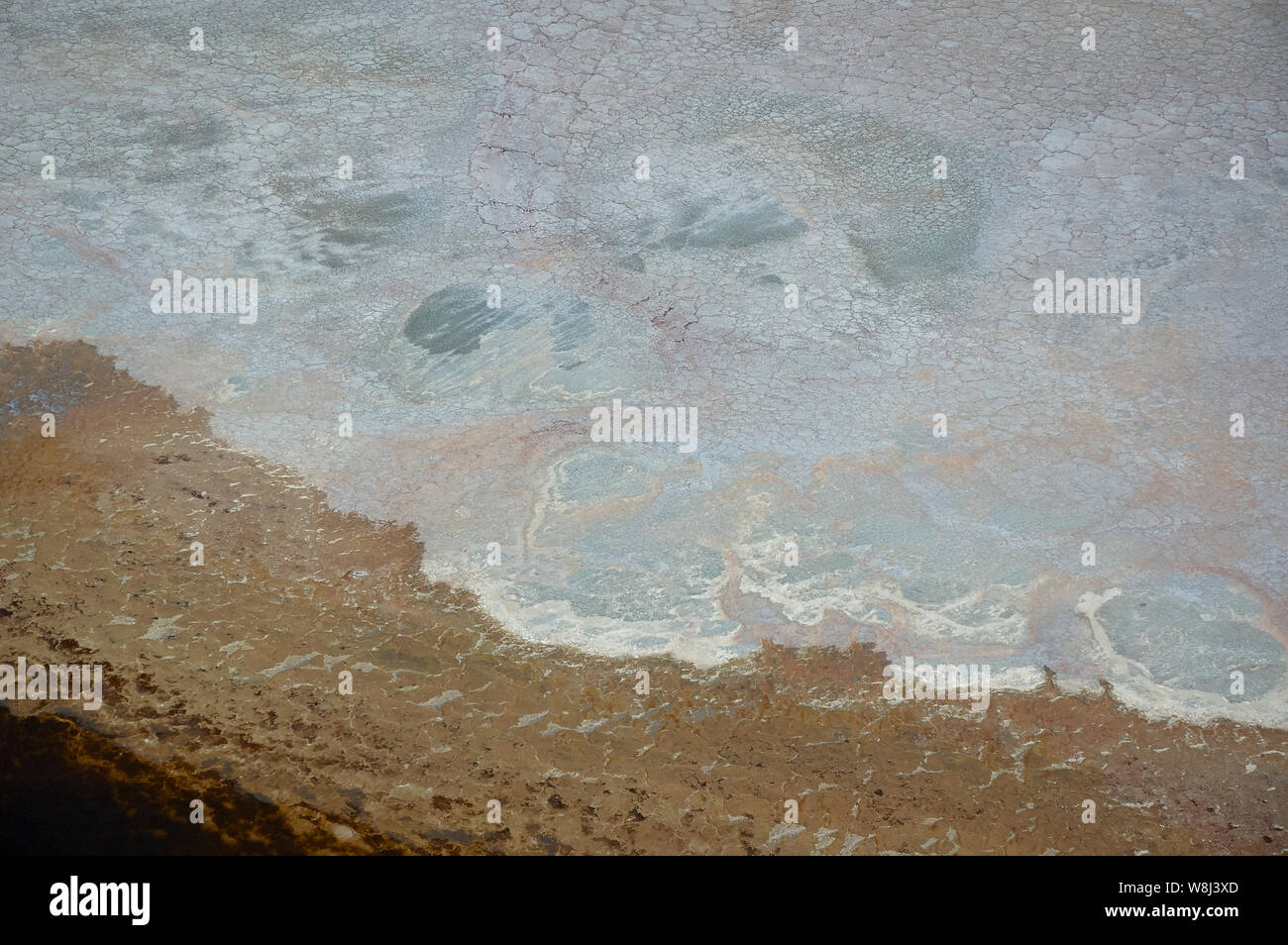 Caustic sediments (mainly soda) on the drying lake floor of Lake Natron ...