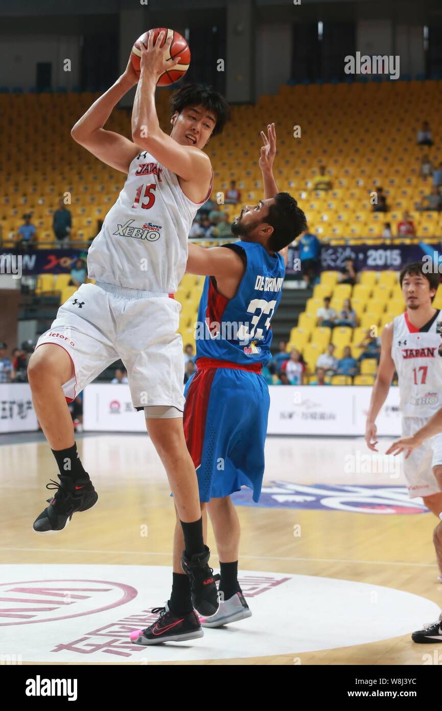 Ranidel De Ocampo of Philippines, right, challenges Joji Takeuchi of ...