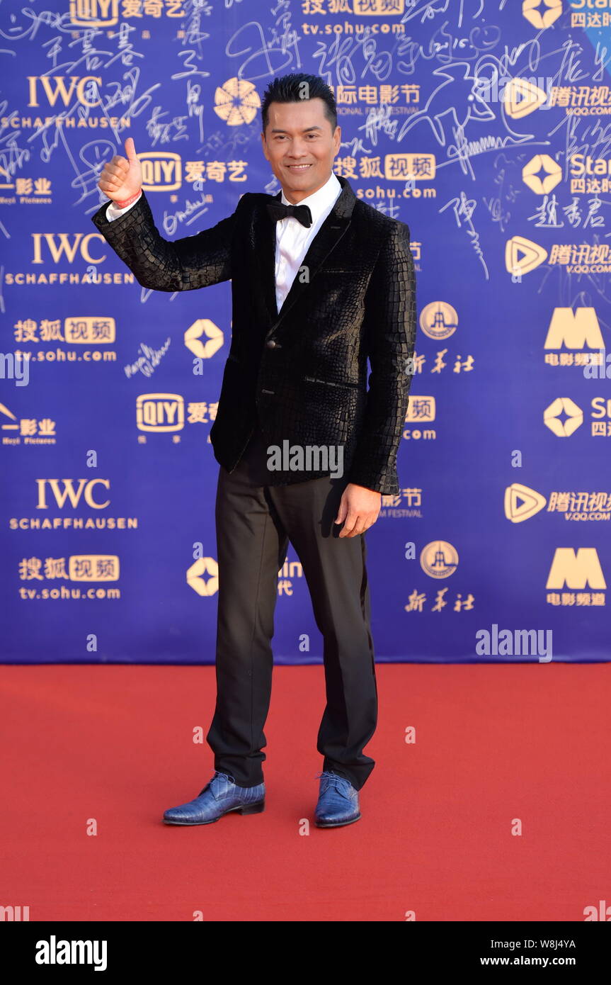 Hong Kong actor Ray Lui poses on the red carpet for the opening ...