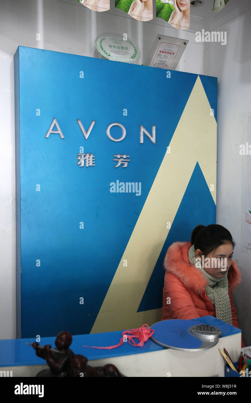 --FILE--A Chinese employee works at a shop of Avon in Shanghai, China ...
