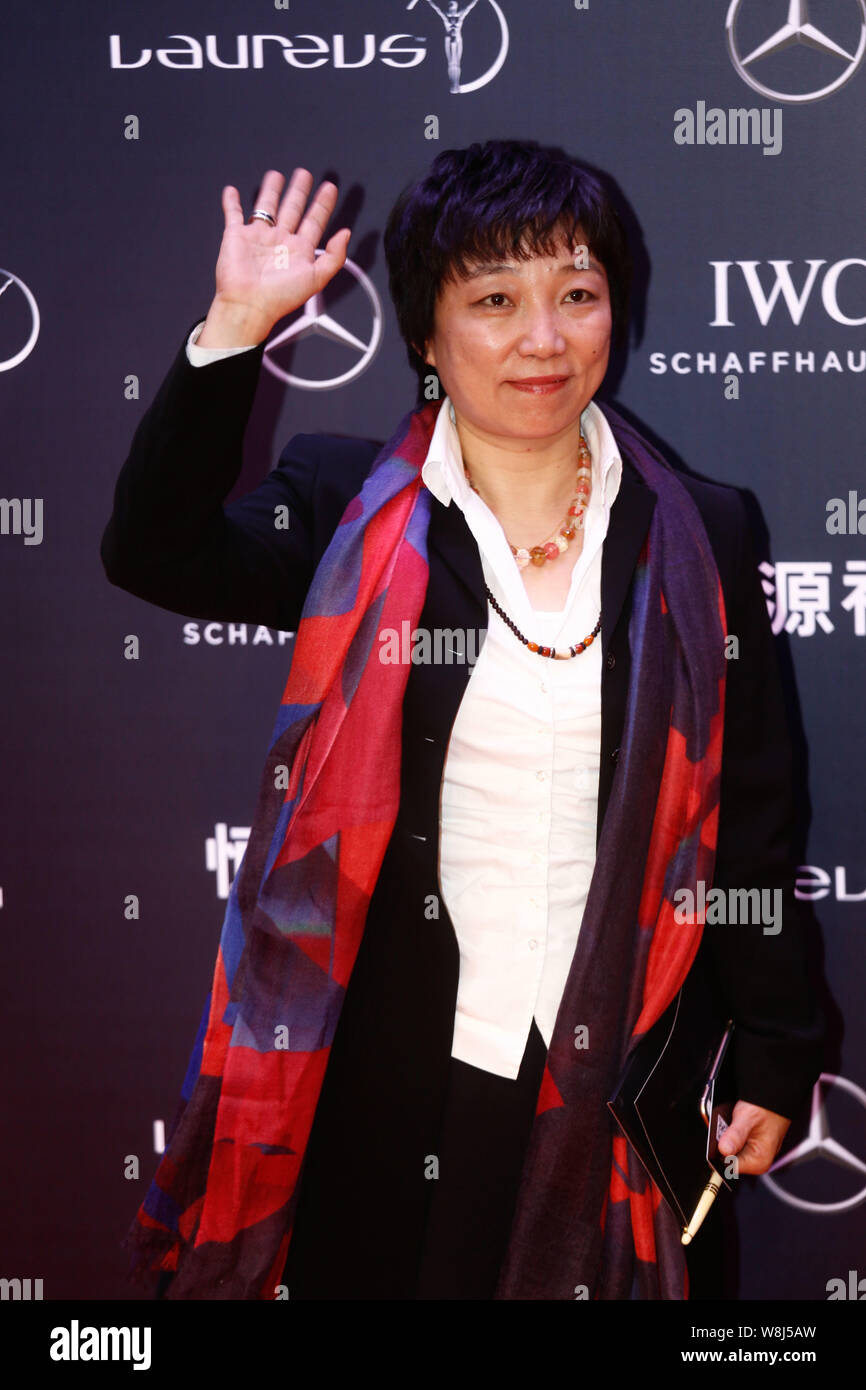 Retired Chinese football star Sun Wen poses on the red carpet for the ...