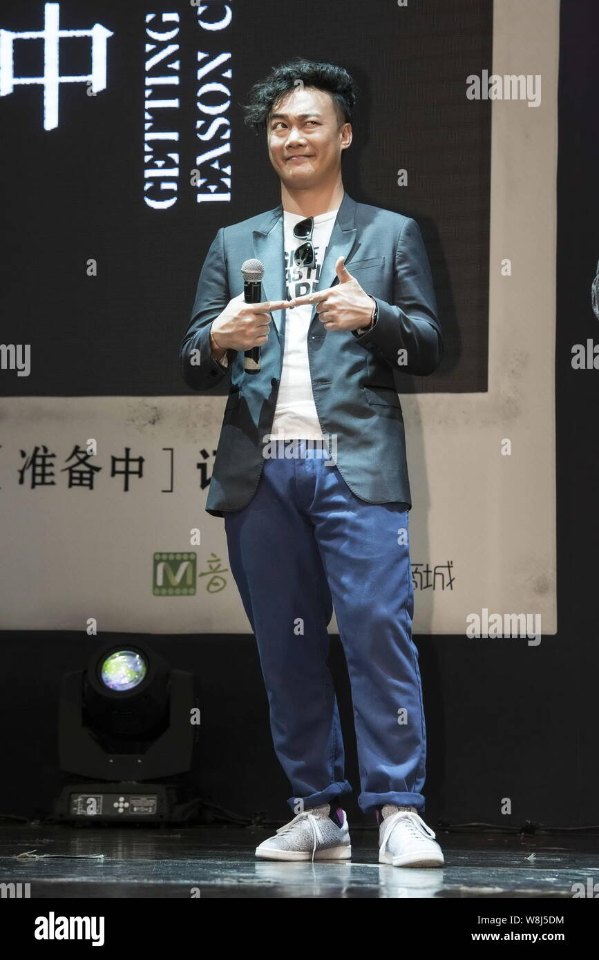 Hong Kong singer Eason Chan makes a face during a press conference for ...