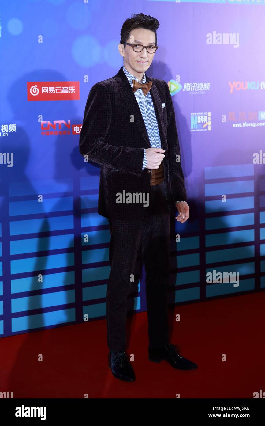 Taiwanese singer Terry Lin poses on the red carpet as he arrives for ...