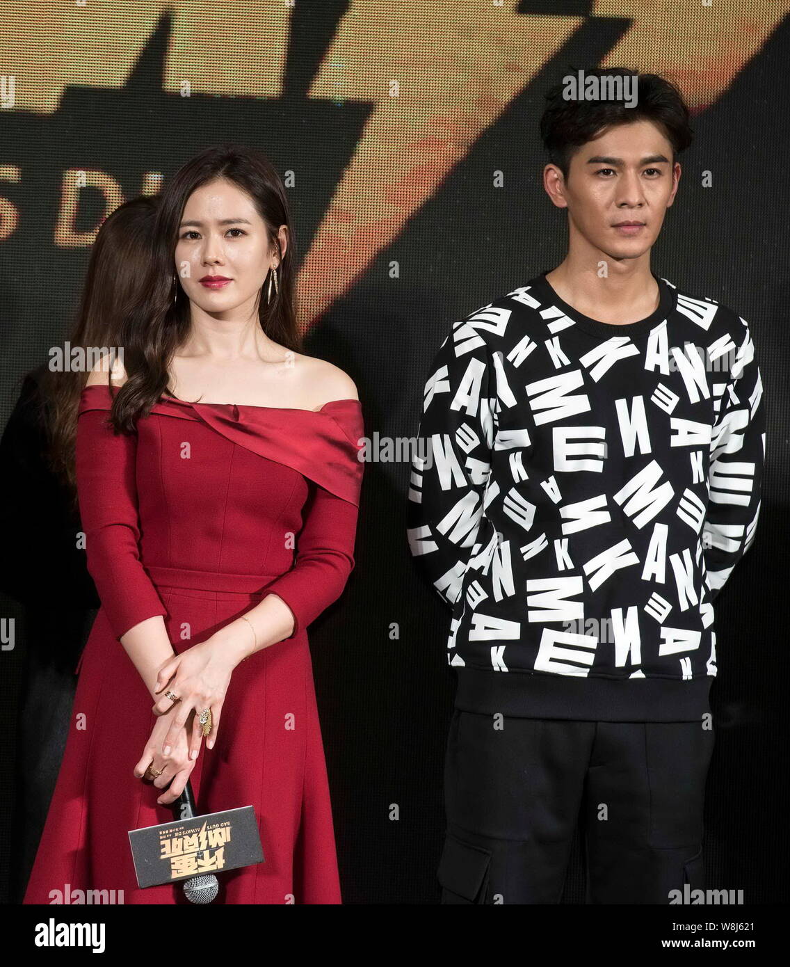 South Korean actress Son Ye-jin, left, and Chinese actor Qiao Zhenyu attend a press conference ...