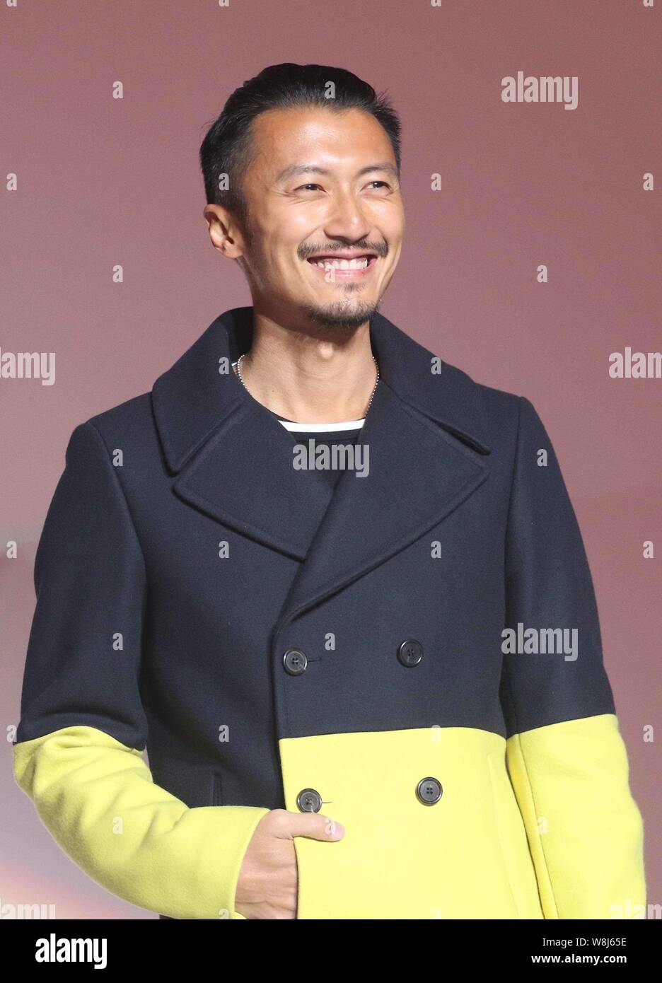 Hong Kong singer and actor Nicholas Tse attends an all-star concert by ...