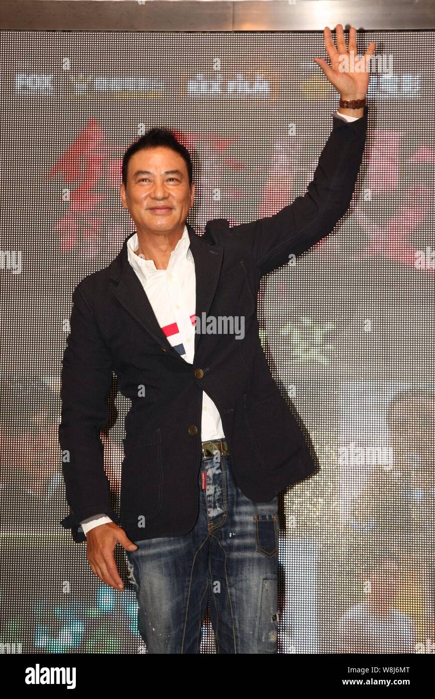 Hong Kong actor Simon Yam waves during a celebration party for his ...