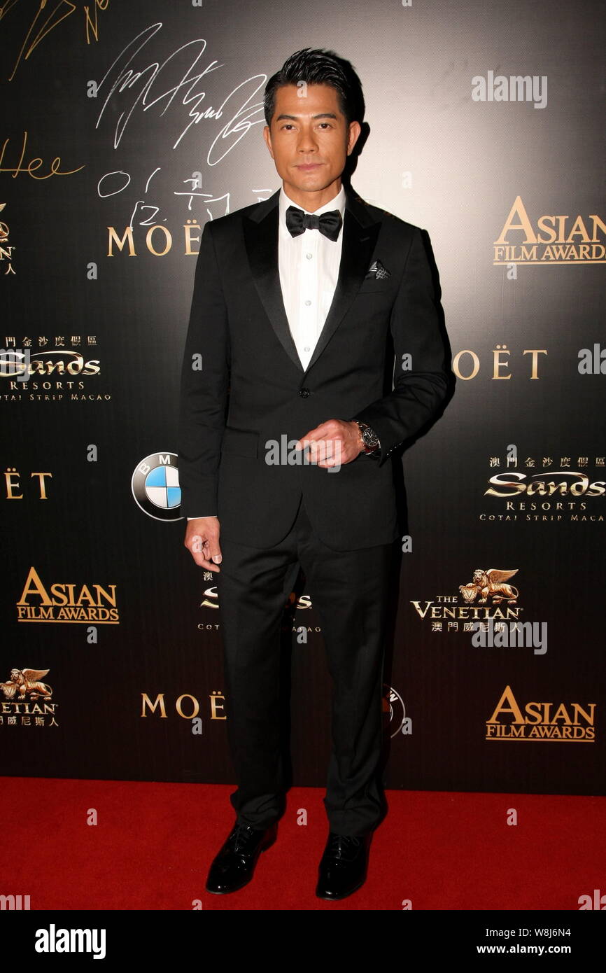 Hong Kong actor Aaron Kwok poses on the red carpet for the 9th Asian ...