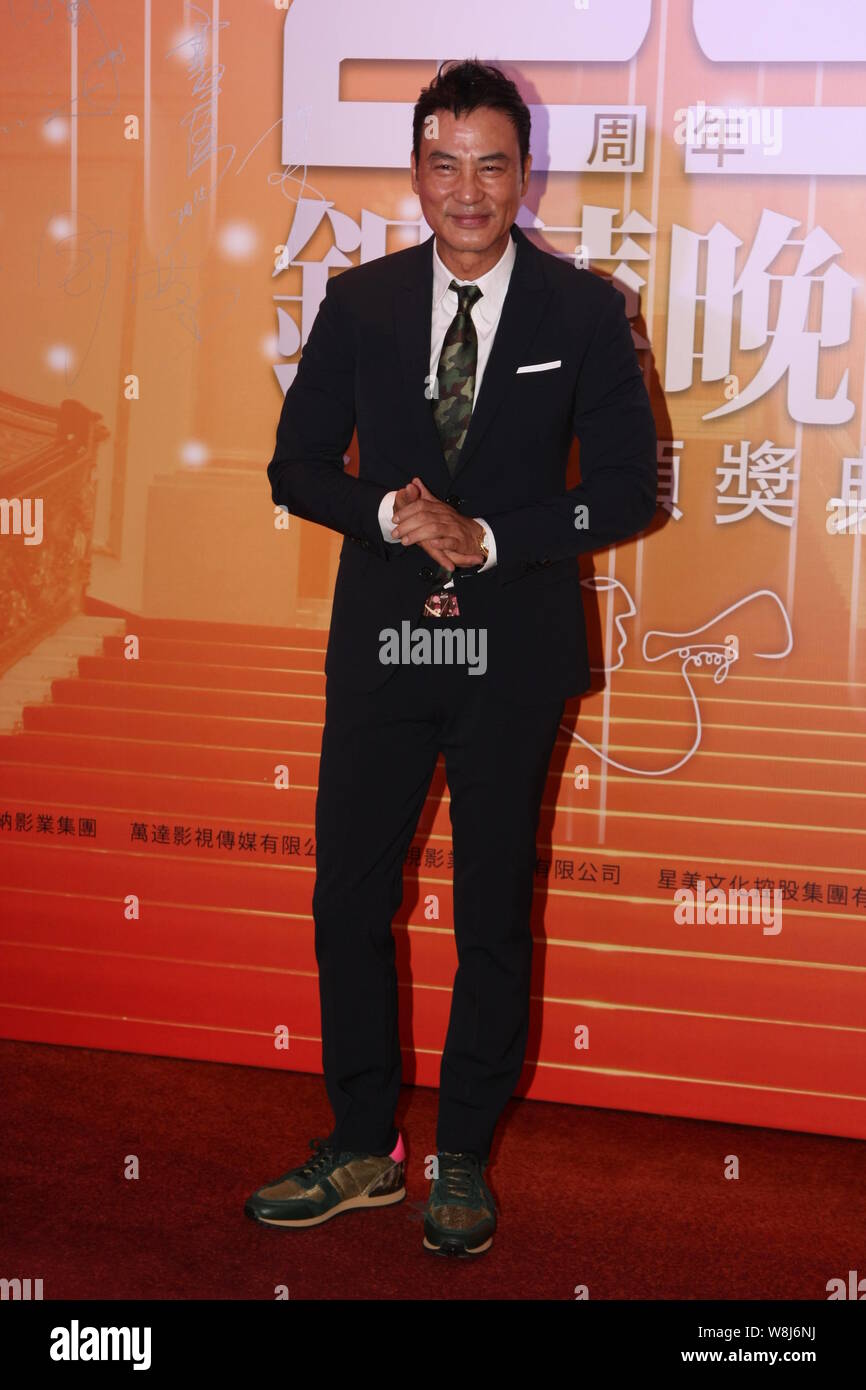 Hong Kong actor Simon Yam poses during the 25th anniversary party and ...