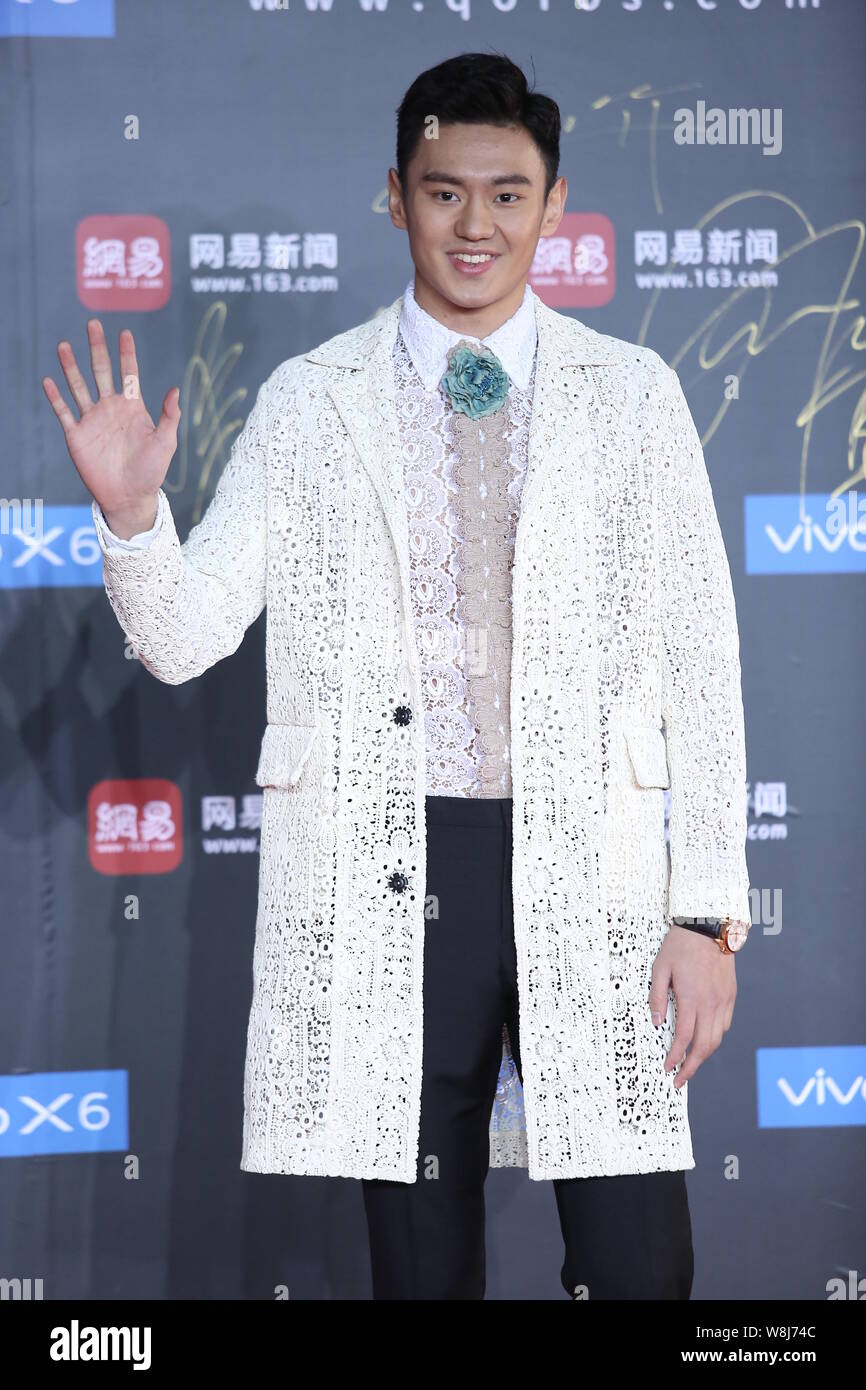 Chinese world swimming champion Ning Zetao poses at the figure award ...