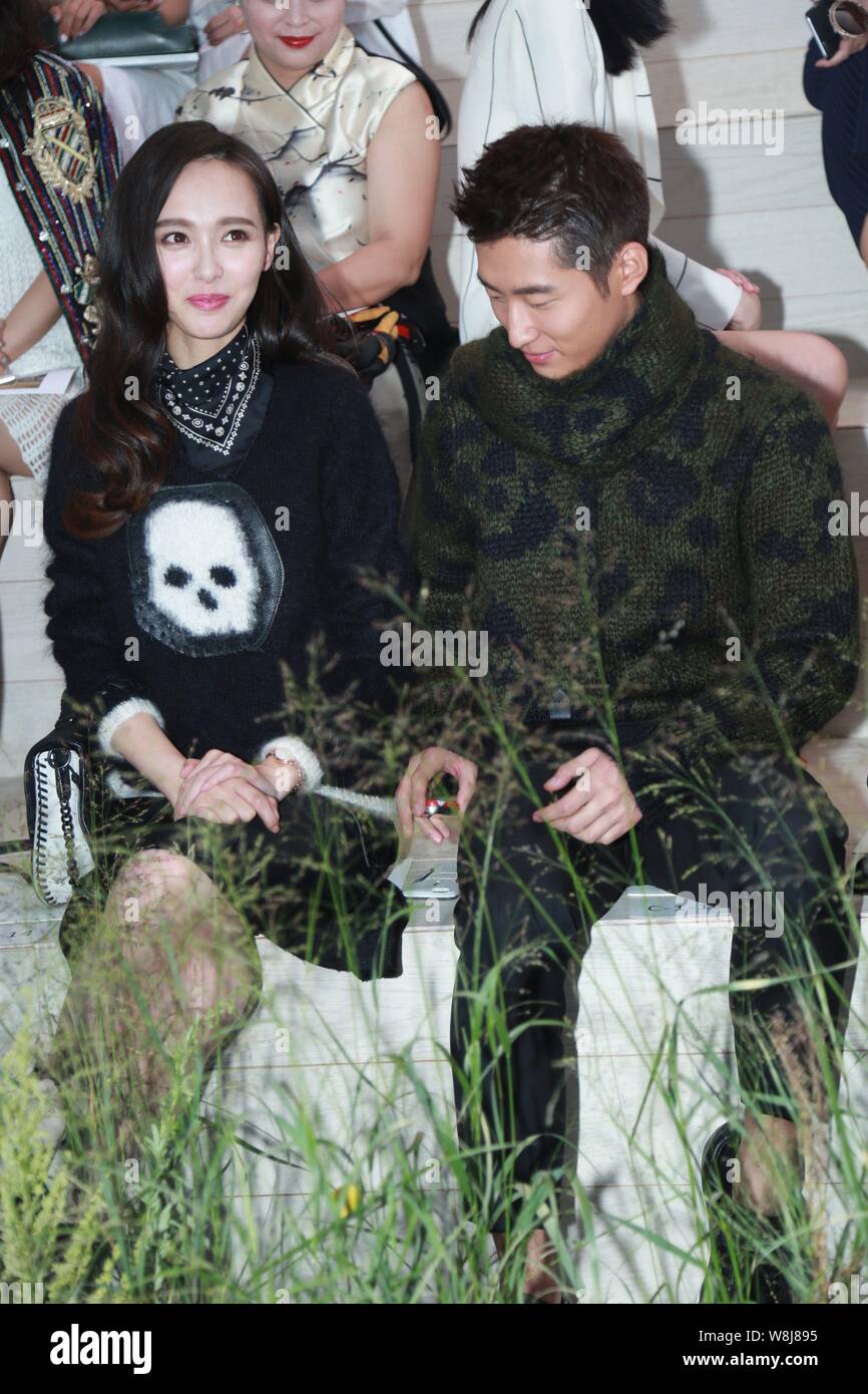 Chinese actress Tang Yan, left, and actor Dou Xiao attend the Coach ...