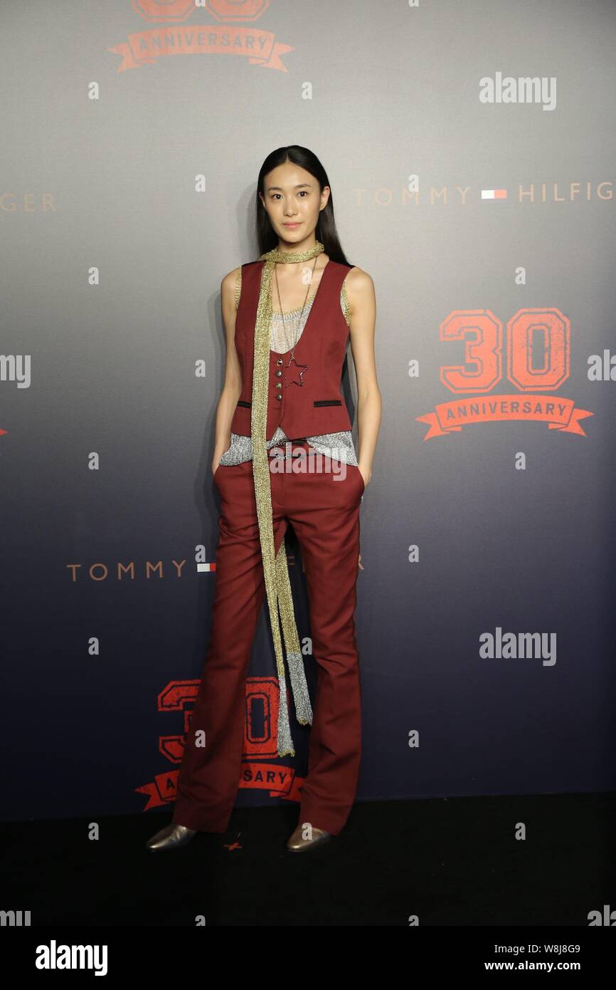 Chinese model Qin Shupei poses on the red carpet for the Tommy Hilfiger ...