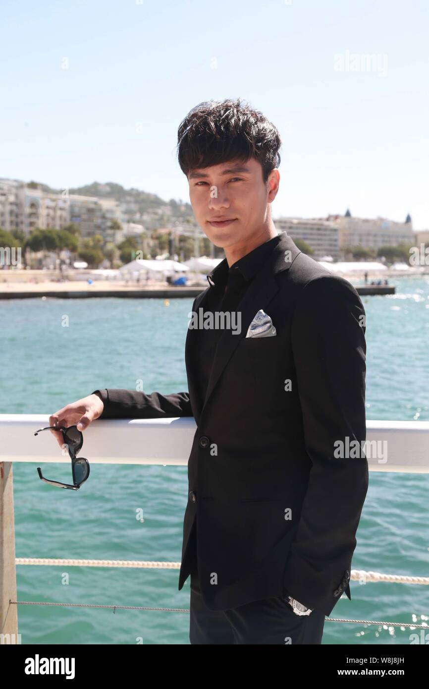 Chinese actor Chen Kun poses at a photocall for his movie "The Ghouls ...