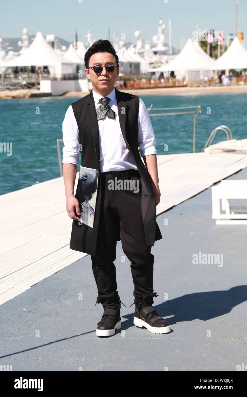 Chinese actor Huang Bo poses at a photocall for his movie "The Ghouls ...