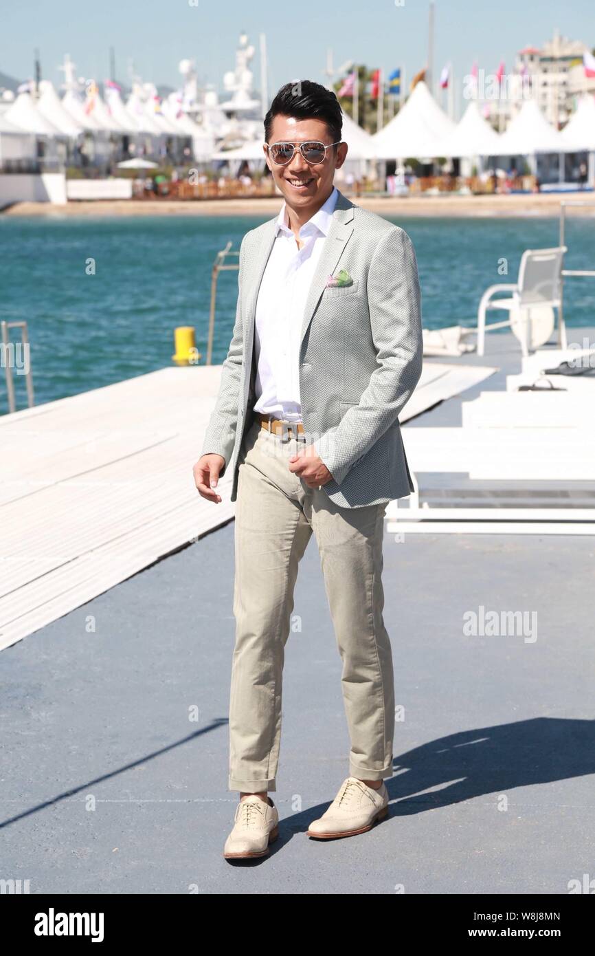 Chinese actor Xia Yu poses at a photocall for his movie "The Ghouls ...