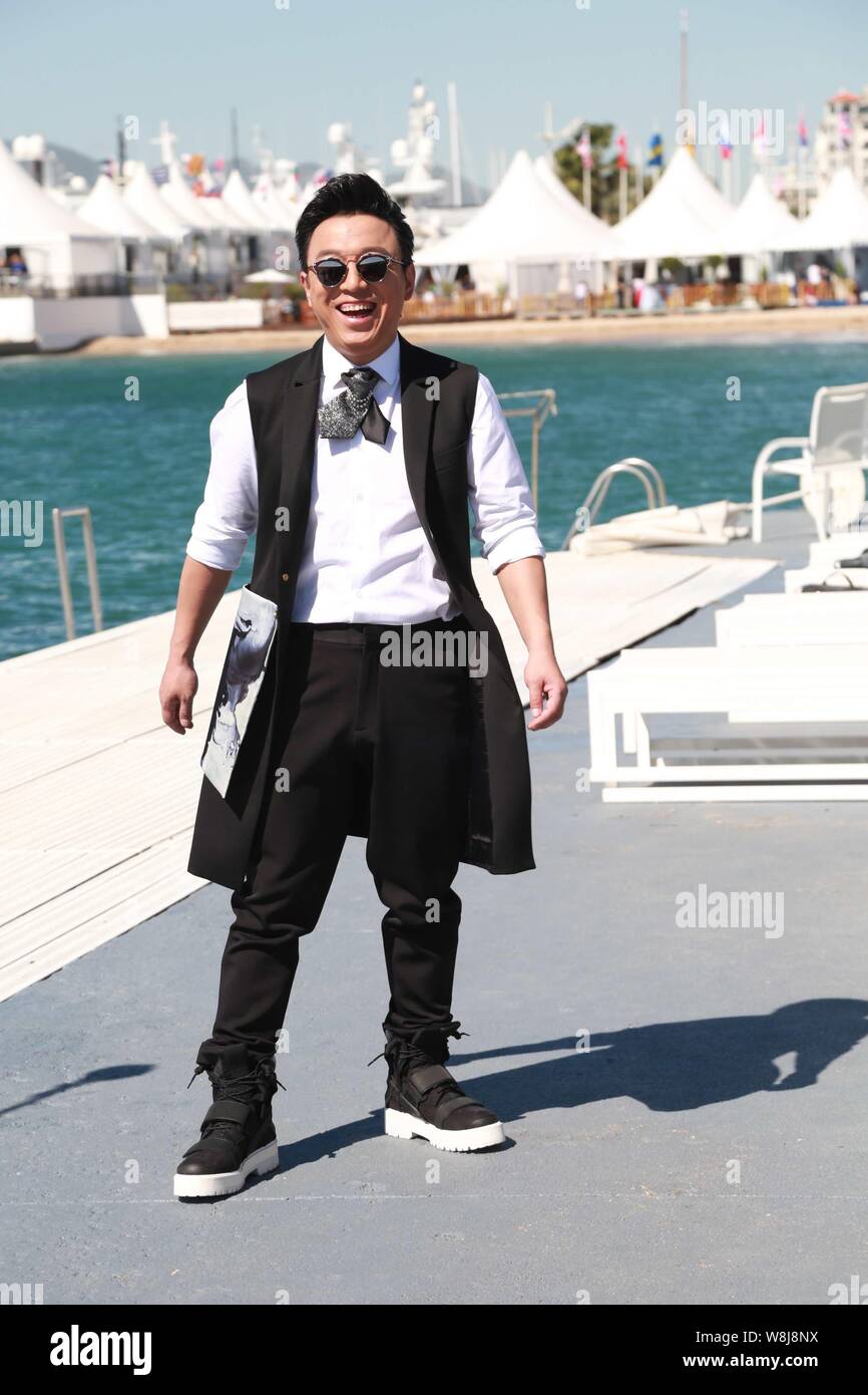 Chinese actor Huang Bo poses at a photocall for his movie "The Ghouls ...