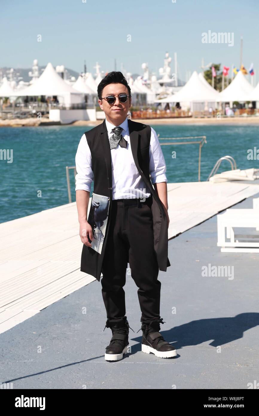 Chinese actor Huang Bo poses at a photocall for his movie "The Ghouls ...
