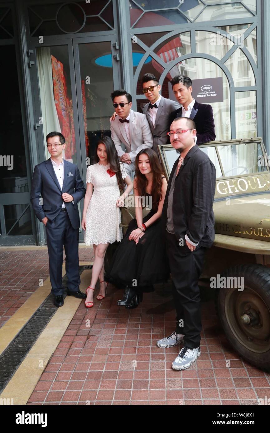 Cast members pose at a photocall for their movie "The Ghouls" during ...