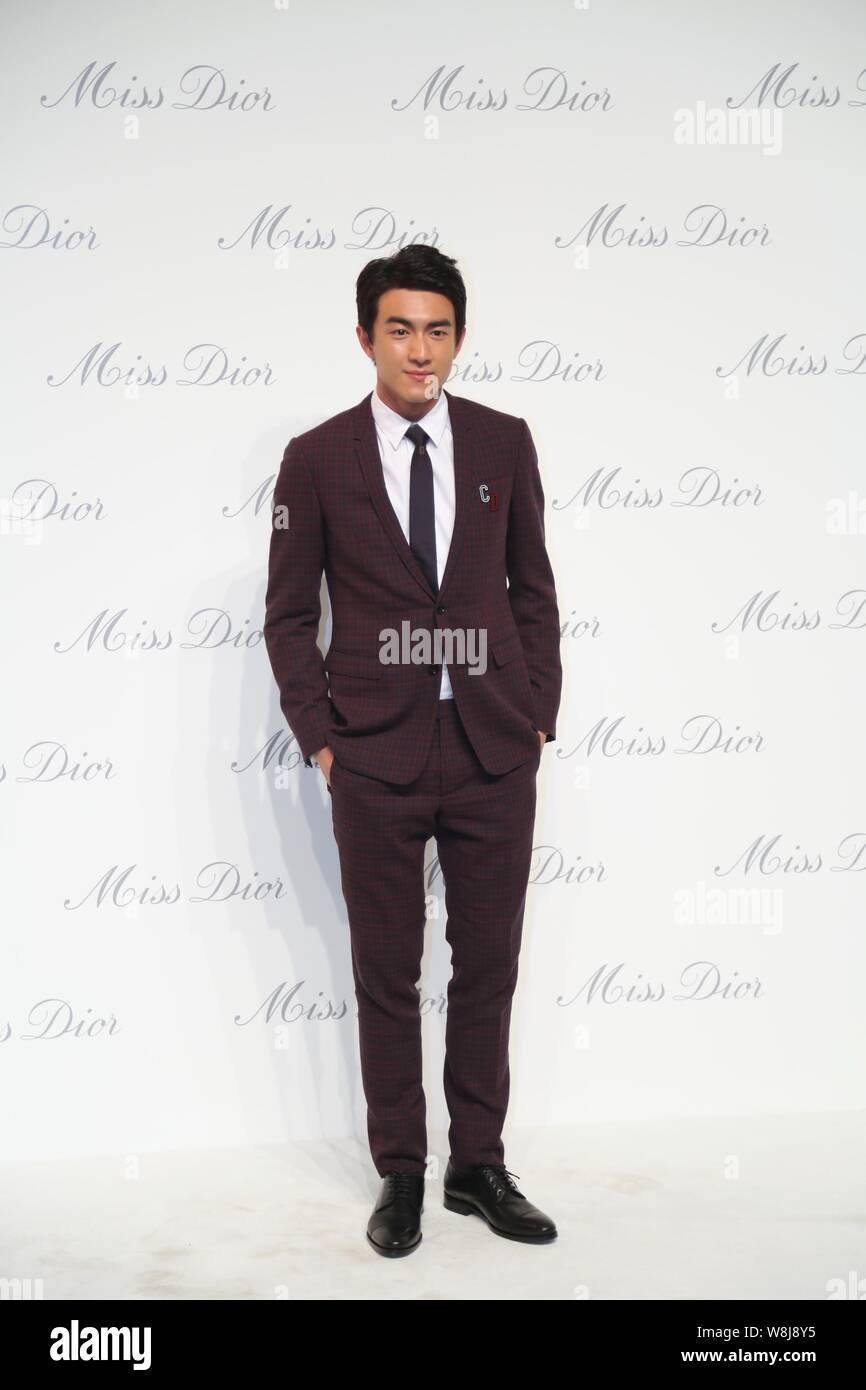 Chinese actor Lin Gengxin poses as he arrives for an opening event for ...