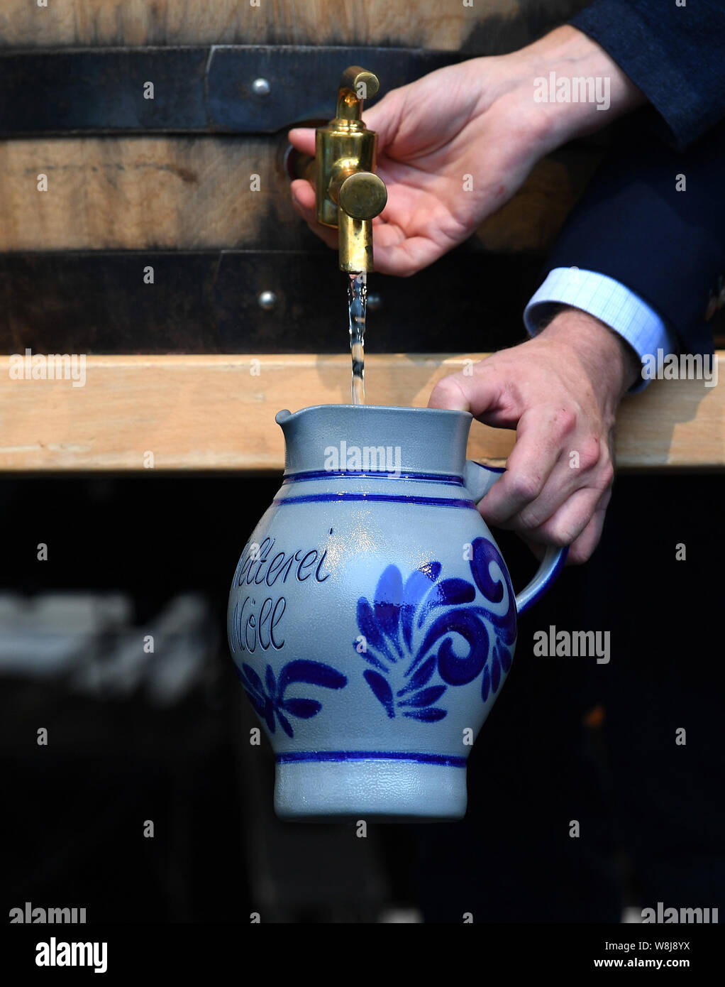 Frankfurt, Germany. 9th Aug, 2019. Apple wine is filled into the ...