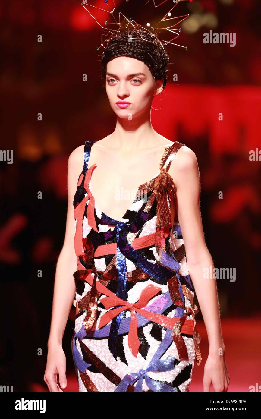 A model displays a new creation at the Schiaparelli fashion show during ...