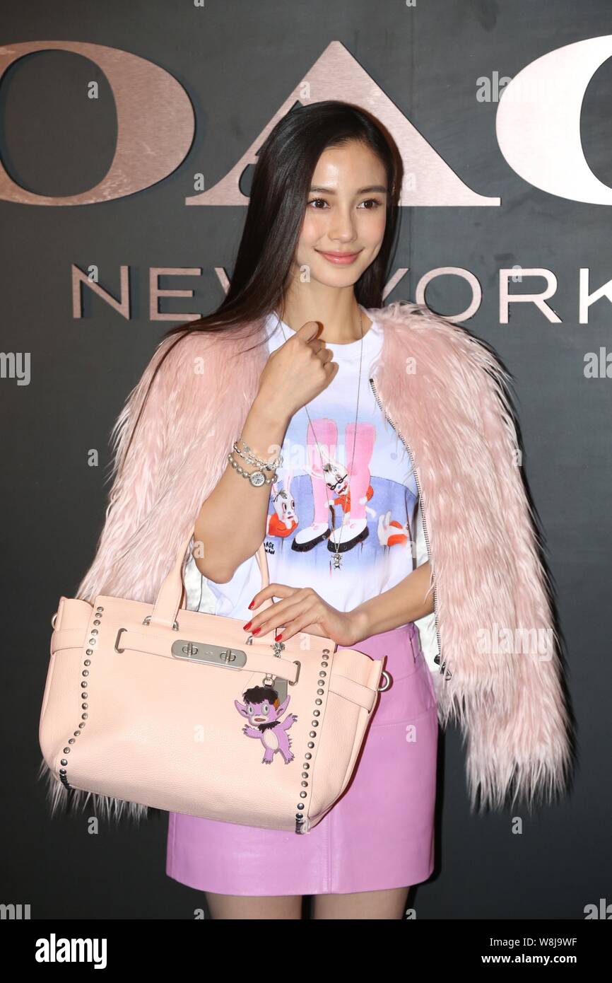 Hong Kong model and actress Angelababy poses during the opening ceremony for Coach's new fashion ...