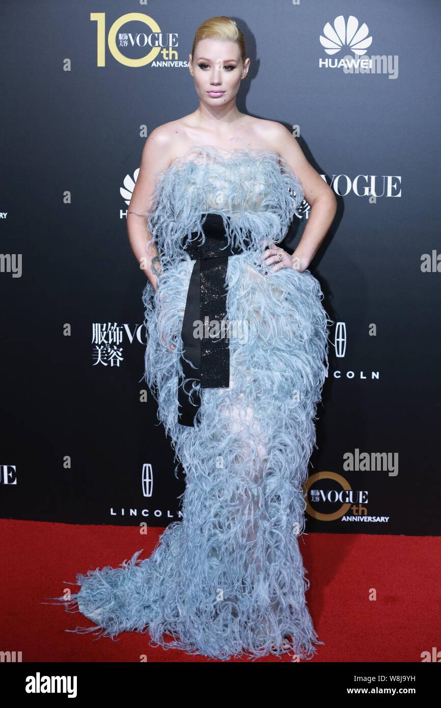 Australian rapper Iggy Azalea poses on the red carpet of the 10th ...