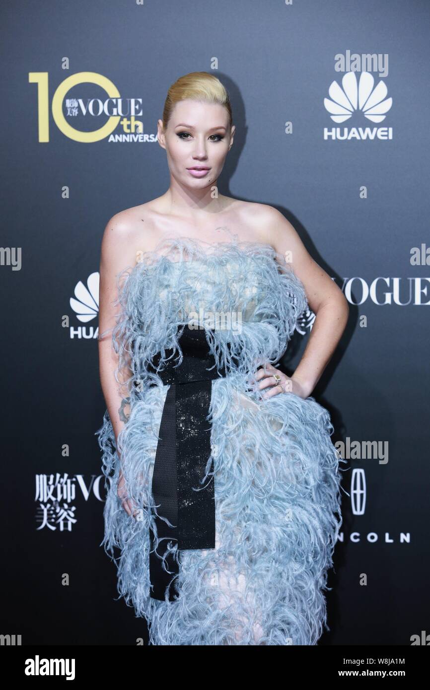 Australian rapper Iggy Azalea poses on the red carpet of the 10th ...