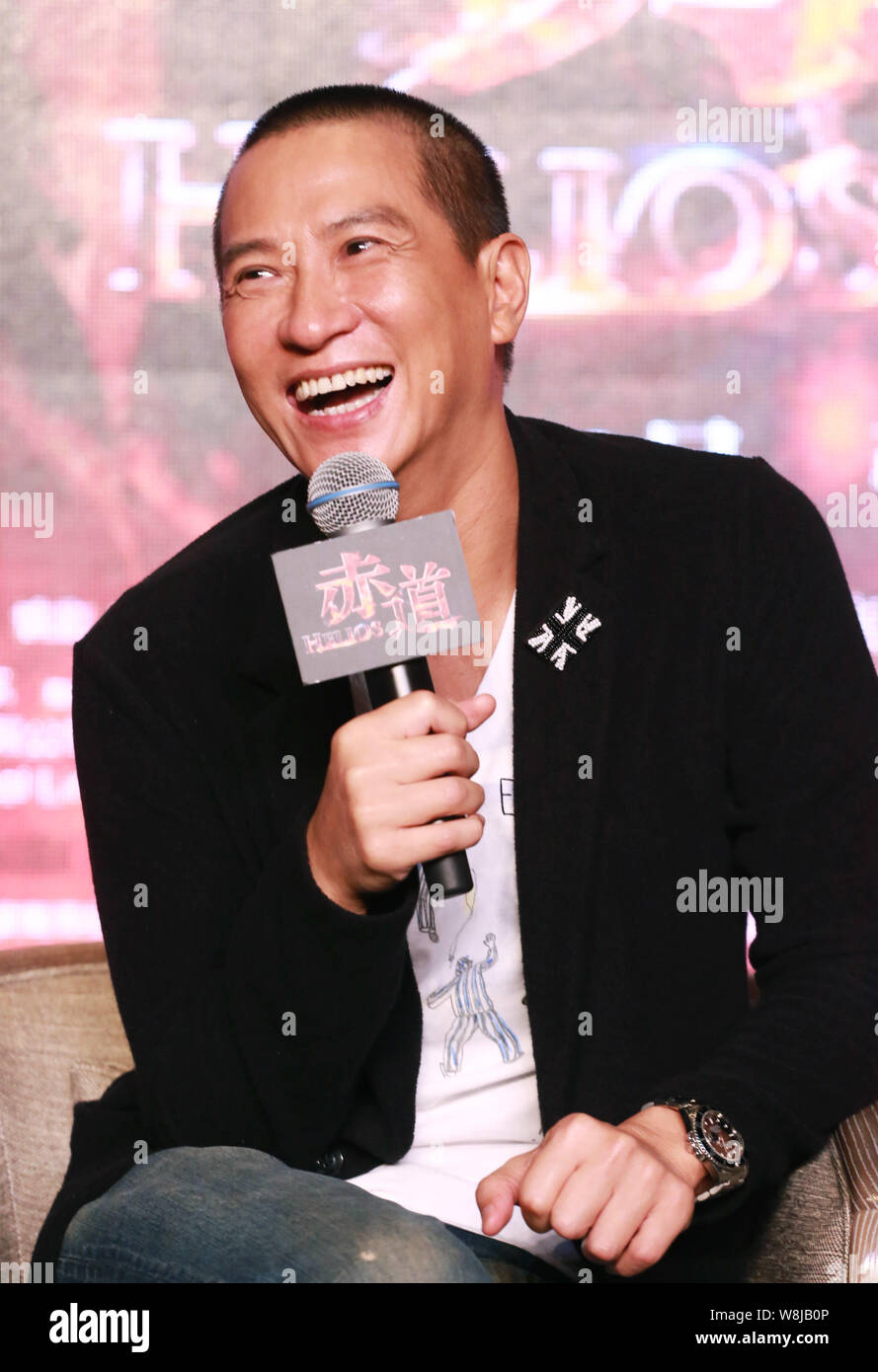 Hong Kong singer and actor Nick Cheung reacts during a press conference ...
