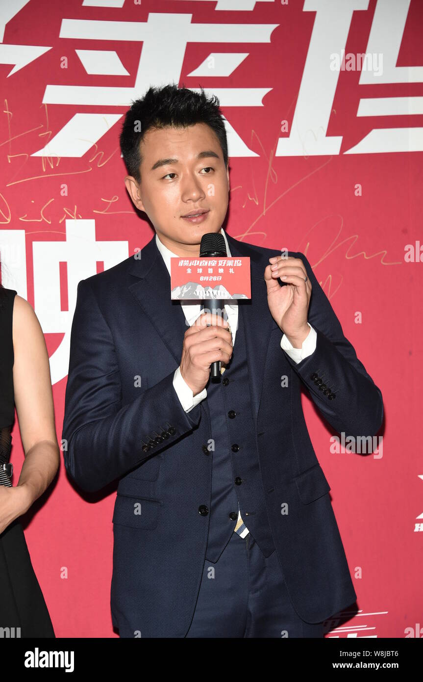 Chinese actor Tong Dawei speaks on the red carpet for the premiere of ...