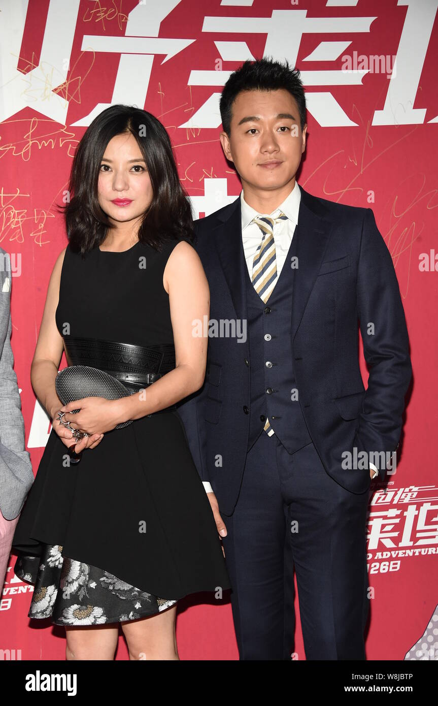 Chinese actress Zhao Wei, left, and actor Tong Dawei pose on the red ...