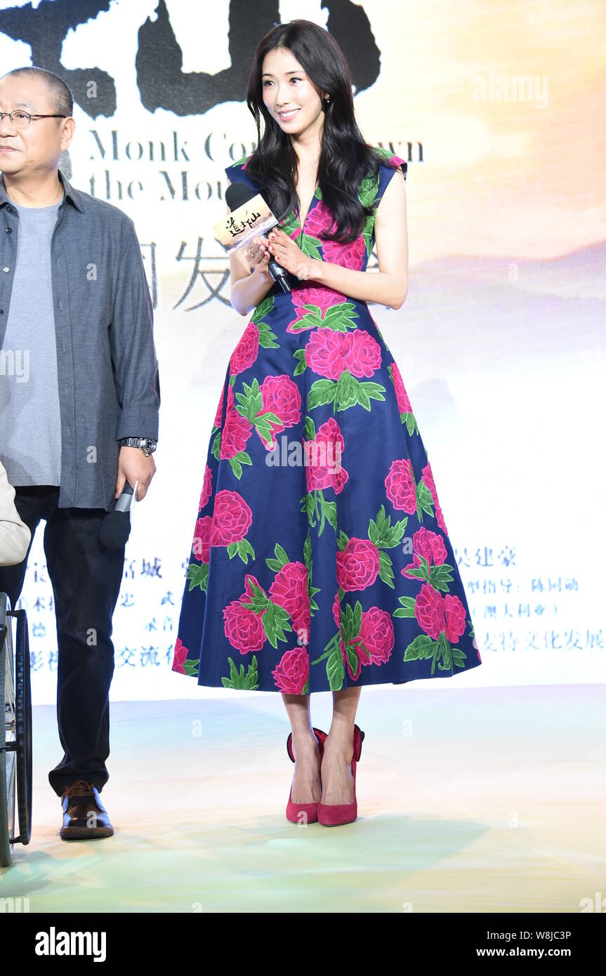 Taiwanese actress Lin Chi-ling, right, smiles during a press conference ...