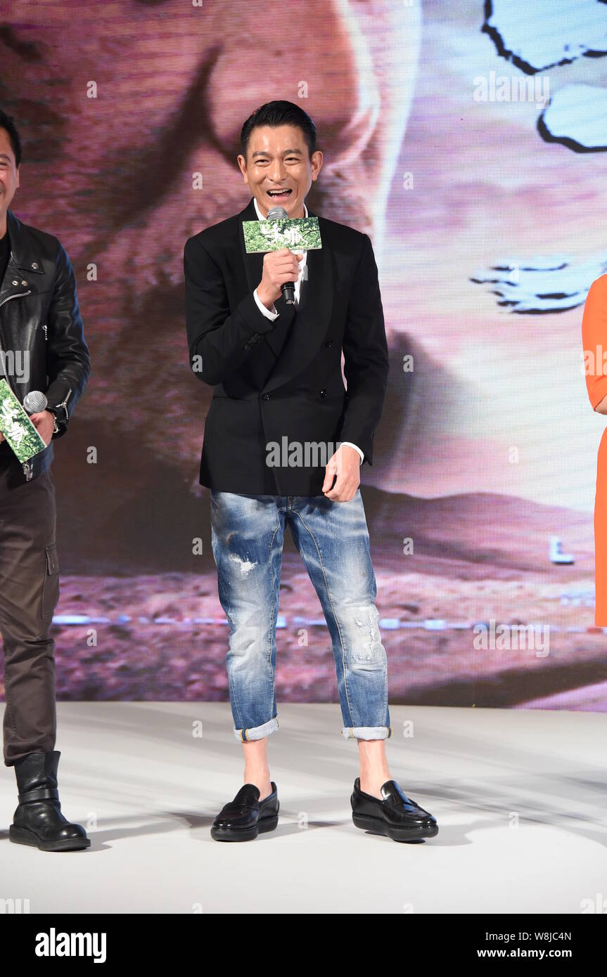 Hong Kong actor and singer Andy Lau laughs during a press conference ...