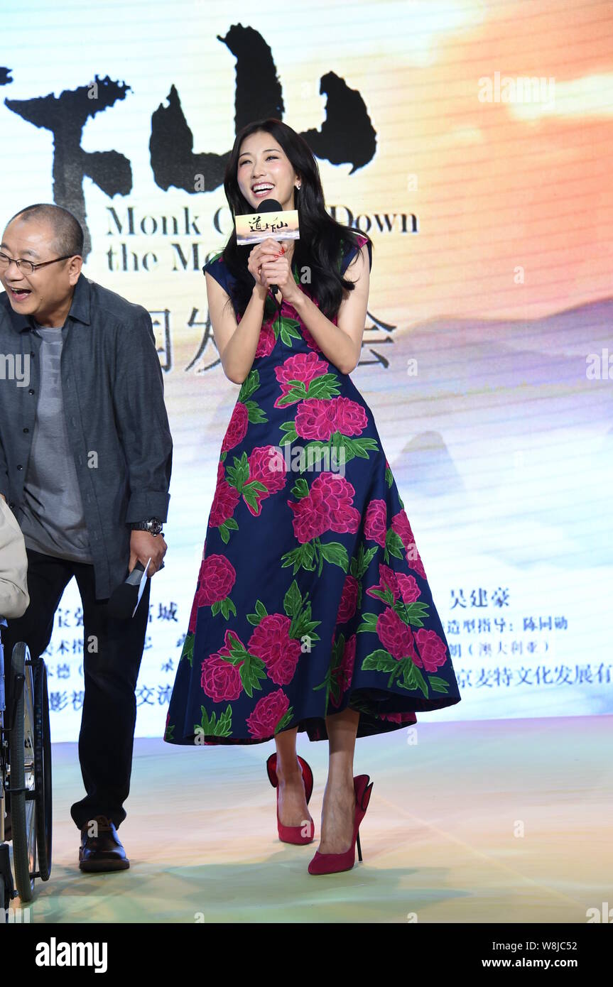 Taiwanese actress Lin Chi-ling, right, smiles during a press conference ...