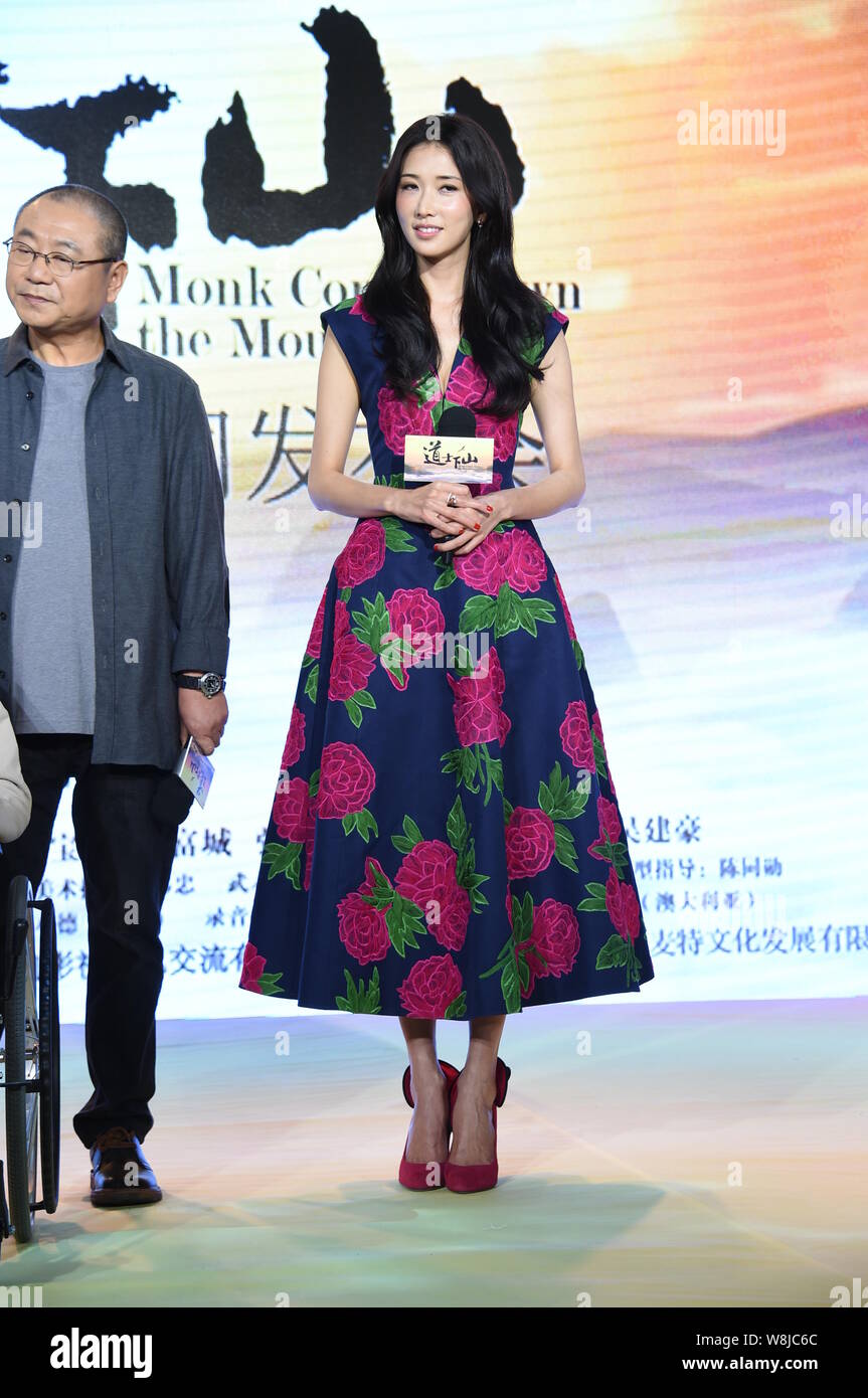 Taiwanese actress Lin Chi-ling, right, poses during a press conference ...